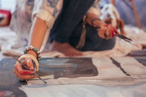 Closeup On Hands Of An Artist While Creating Art By Stocksy