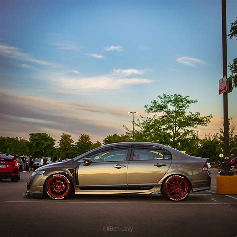 Side Of An 8th Gen Civic On Red Work Wheels
