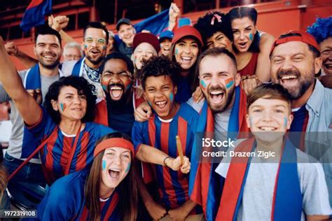 Large Group Excited Of Sports Fans Shouting From Stadium Stands And