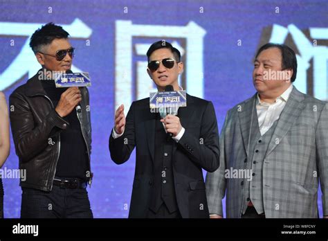 From Left Hong Kong Actor Chow Yun Fat Hong Kong Actor Nick Cheung And Hong Kong Director