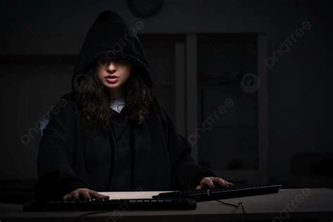 the female hacker hacking security firewall late in office female hacker hacking security