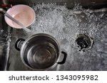 Free Image Of Washing Colored Cups In The Sink With Bubbles Freebie
