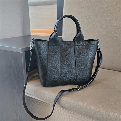 Yimma 소가죽 볼드 스트랩 콤비 토트백 2col 모던한 데일리 직장인가방