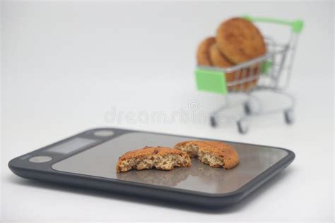 A Pack Of Cookies On An Electronic Kitchen Scale Accurate Calorie