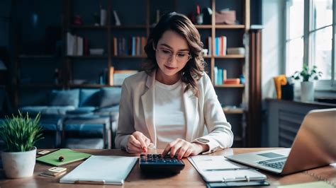 Premium Photo Finance And Accounting Concept Business Woman Working On Desk Using Calculator