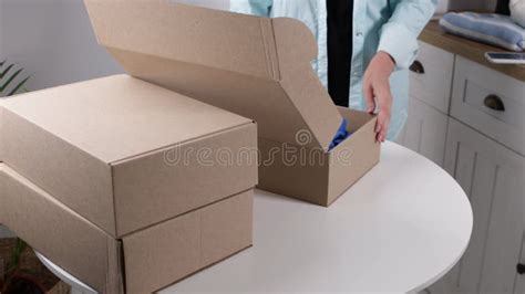 Unrecognizable Woman Packing Clothes In Boxes Stock Video Video Of