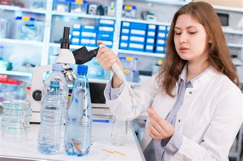 Woman Using Pipette Stock Image F017 2258 Science Photo Library