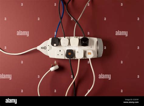Plugs In Extension Socket Stock Photo Alamy