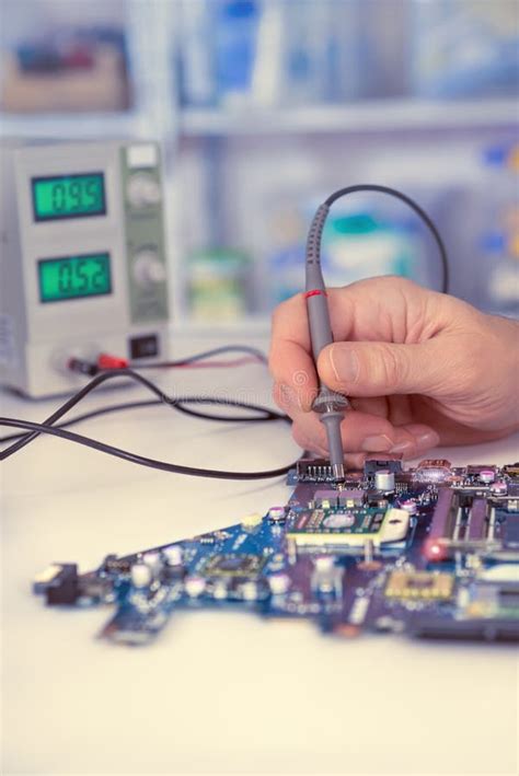 Closeup On The Hands Of Tech Checking Motherboard Stock Image Image Of Closeup Measurement
