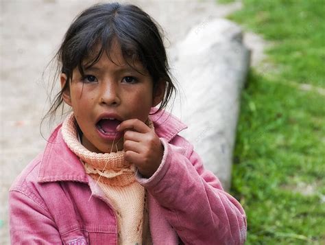 Curious Peruvian Girl Latin Grass Teeth Photo Background And Picture