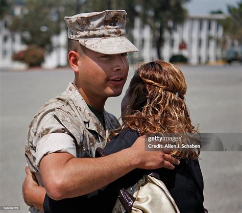 Marine Pfc Ricardo Peralta Hugs His Mom Rosa Peralta Of San Diego
