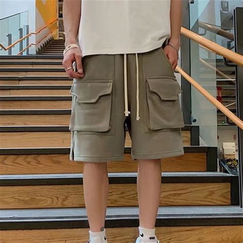 กางเกงขาสั้นลําลอง ขาห้าส่วน ทรงหลวม เข้ากับทุกการแต่งกาย สไตล์ฮ่องกง แฟชั่นฤดูร้อน สําหรับ