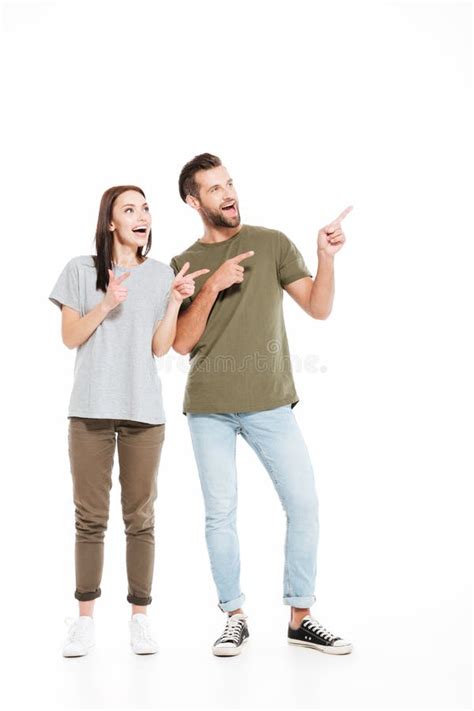 Man And Woman Showing At Empty Space Stock Image Image Of Casual Length