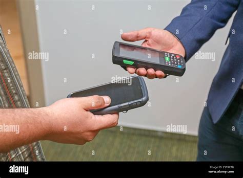 Two Man Holding Portable Computer Devices Equipment Hi Res Stock