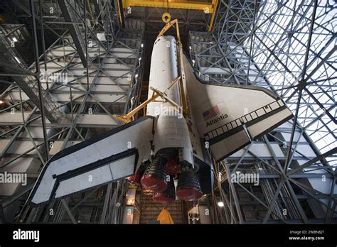 Atlantis Is Lifted In The Vehicle Assembly Building At Kennedy Space