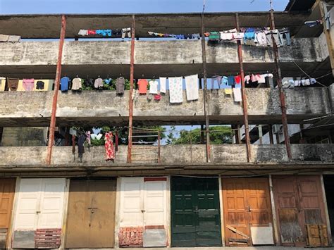 Premium Photo Low Angle View Of Clothes Drying On Building