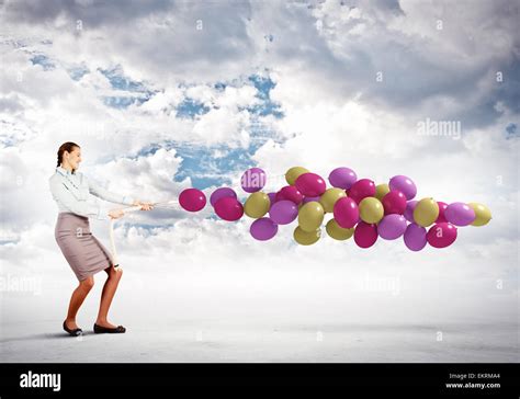 Woman with balloons Stock Photo - Alamy
