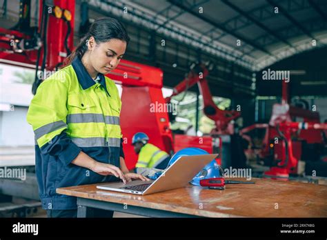 Indian Young Smart Software Engineer Machine Programmer Woman Working Check Service Robotic