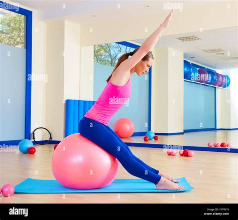 Pilates Woman Fitball Swiss Ball Exercise Workout At Gym Indoor Stock