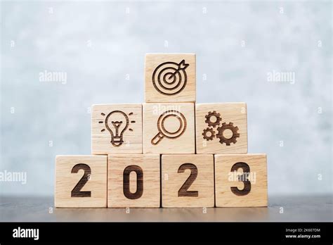 2023 Wood Block With Business Success Goal Strategy Target Mission
