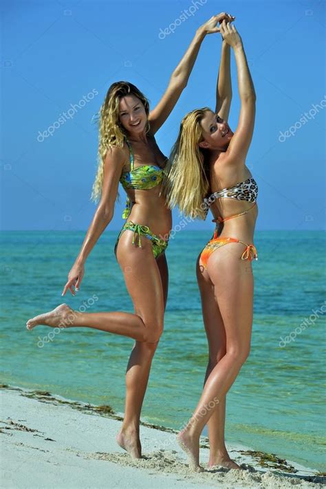Two Bikini Models Posing Sexy At Tropical Beach Stock Photo Fashionstock
