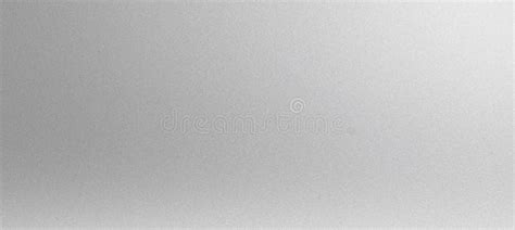 Silver Gradient Background With A Grainy Texture Reflecting A Light Source From Above Stock