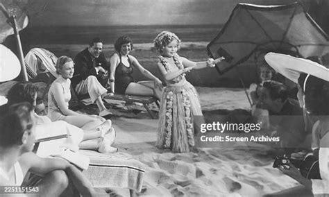 Shirley Temple Hula Dancing On Beach In Scene With Rochelle Hudson
