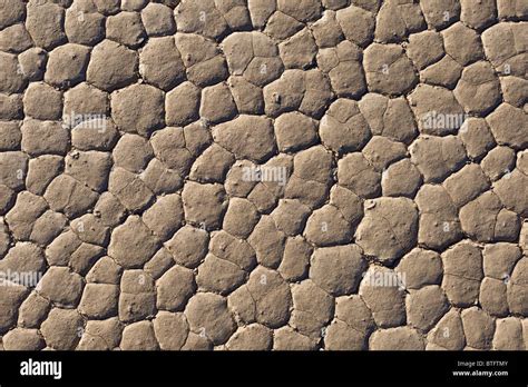 Hexagonal Pattern Formed In Mud Cracks At The Dry Lake Bed Of The Stock