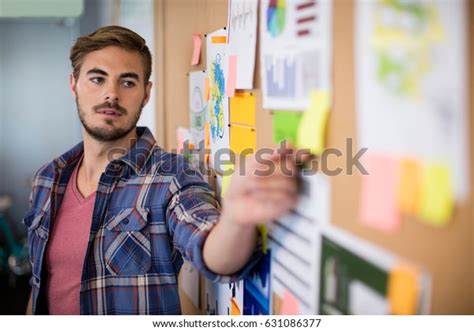 Man Touching Sticky Note On Board Stock Photo Shutterstock