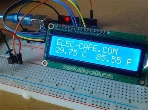An Electronic Clock On Top Of A Breadboard