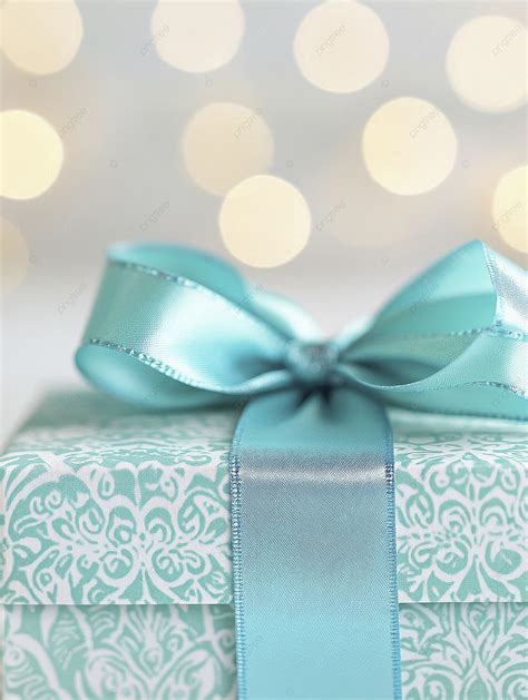 보케 조명 효과가 있는 파란색 배경에 연한 파란색 리본이 있는 축하 개념 베이지색 선물 상자 배경 화면 및 일러스트 무료 다운로드 Pngtree