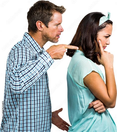 Angry Man Pointing Woman With Hand On Chin Stock Photo Adobe Stock
