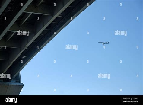 Plane On Landing Approach Flying Over Bridge Woodrow Wilson Bridge