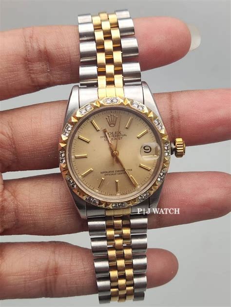 Rolex Datejust 31mm Steel And Yg Champagne Dial Ref68273
