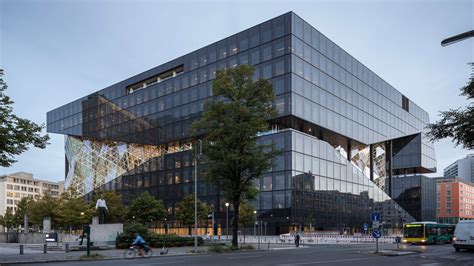 Faceted Glass Atrium Bisects Oma S Axel Springer Building In Berlin