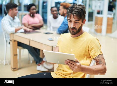 Streamlining The Project Management Process With One Smart Tool A Young Businessman Using A