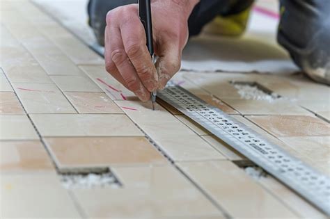 Premium Photo A Person Is Using A Ruler With A Green Marker