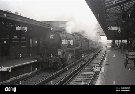 1950s Historical Steam Locomotive 30477 At A Railway Station England Uk The Lswr H15 Class 1950s Historical Steam Locomotive 30477 At A Railway Station England Uk The Lswr H15 Class