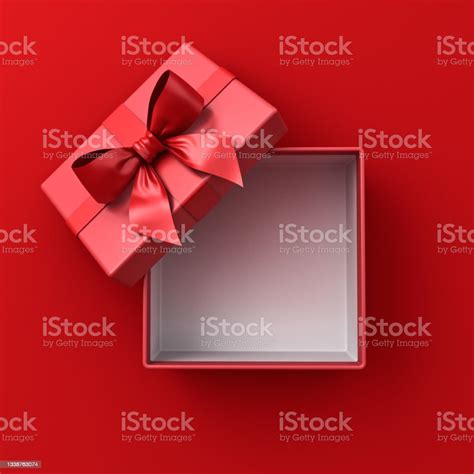 빨간색 리본과 활 또는 그림자 최소한의 개념으로 빨간색 배경에 고립 된 오픈 레드 선물 상자의 상단 보기가있는 빈 빨간색 선물