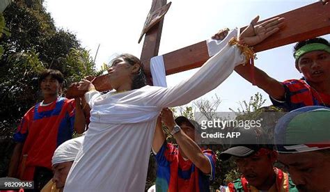 Crucified Female Photos And Premium High Res Pictures Getty Images