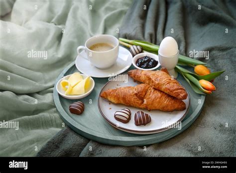 Breakfast Served With Love In Bed Coffee Croissant Jam Egg Some