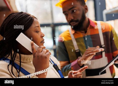 Storehouse Managers Giving Dispatching Information On Warehouse