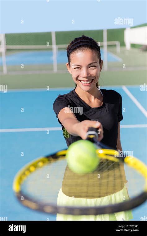 Tennis Girl Holding Racket And Ball On Court Asian Woman Sport Athlete