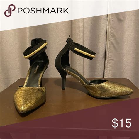 Black And Gold Heels With Ankle Strap And Gold Toe Detail