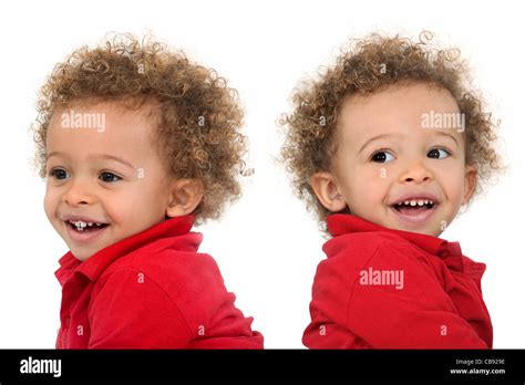 Adorable Looking Twins With Curly Hair Stock Photo Alamy