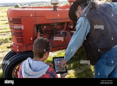 Man Fixing Tractor Hi Res Stock Photography And Images Alamy