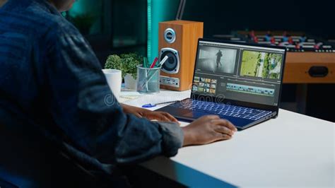 Woman Using Mouse To Edit Movie Project Footage In Apartment Office Stock Image Image Of