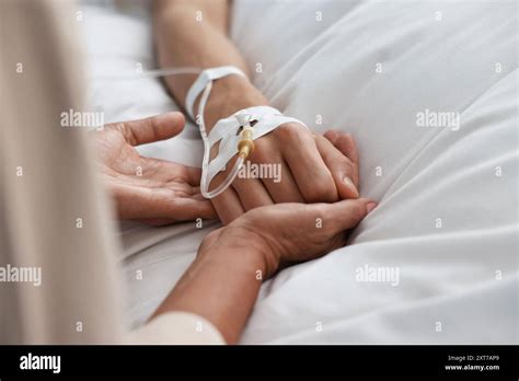 Coma Patient Woman Near His Unconscious Son In Hospital Closeup Stock