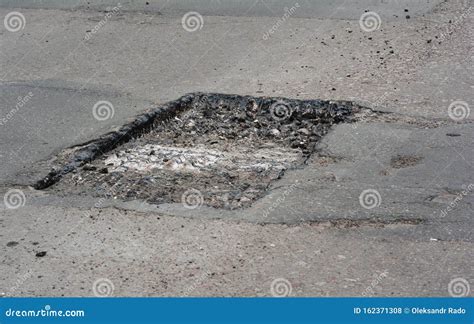 Repair Asphalt Road Pavement Hole And Laying New Asphalt Patching