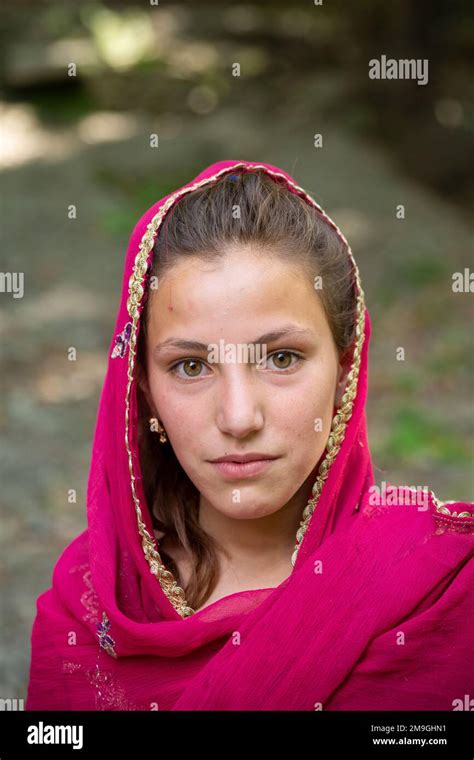 Portrait Of A Young Pashtun Girl With Red Headscarf Bumburet Valley